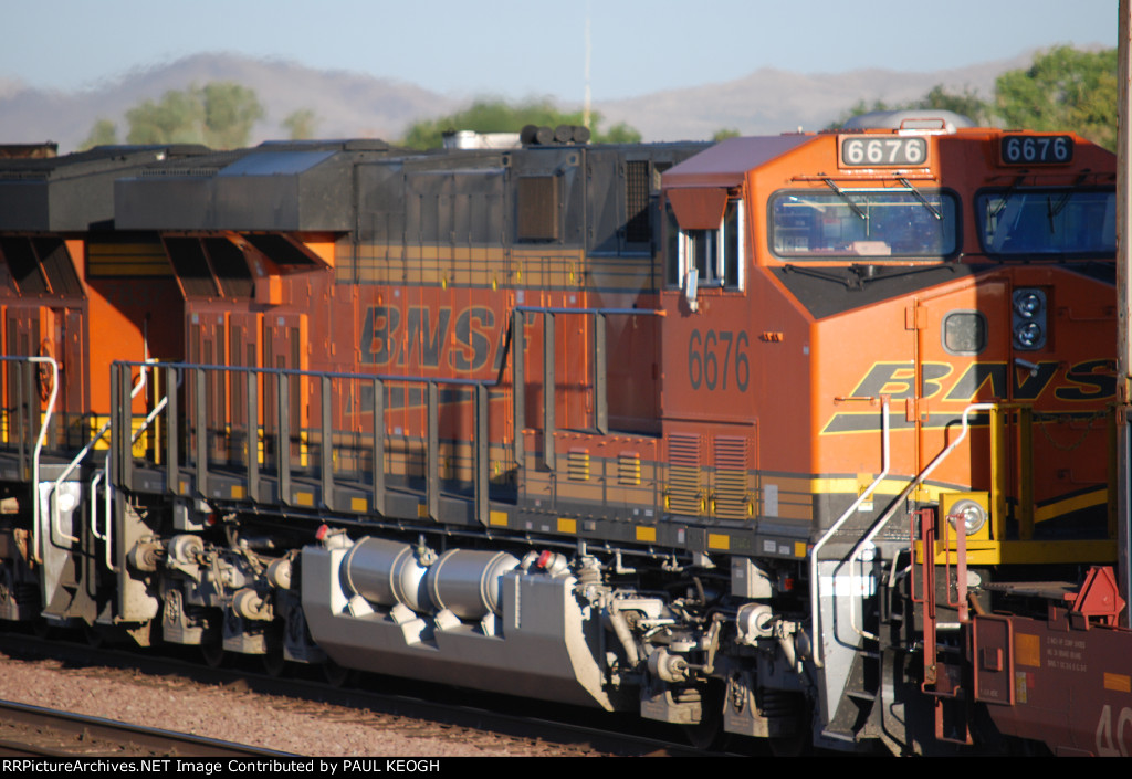 BNSF 6676 as a #2 unit pulls a Hot Z westward with Two Very, Very Brand New ES44C4's (BNSF 6743 ...